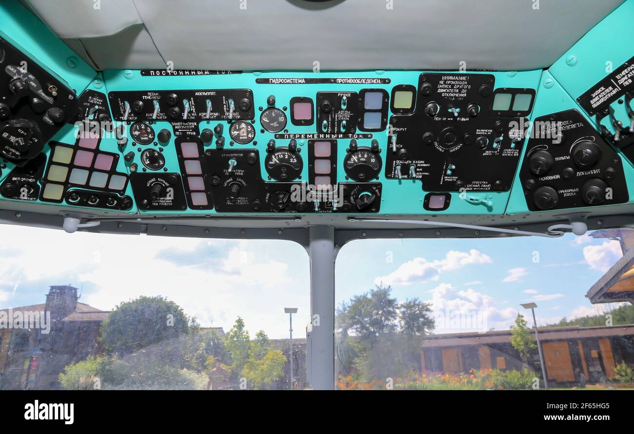 The cockpit of a Russian helicopter with control devices (the names of ...