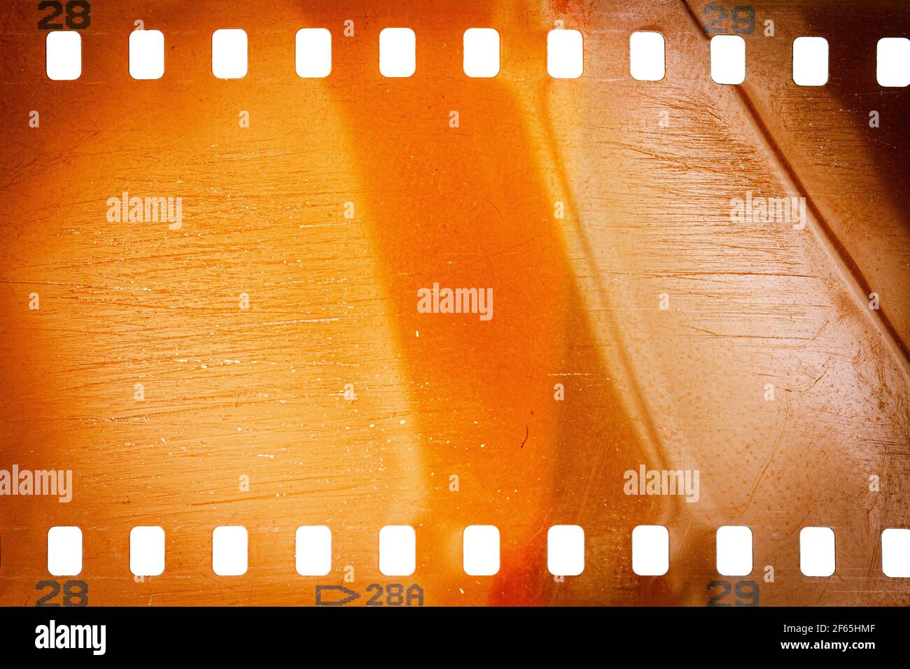 Dusty and grungy 35mm film texture or surface. Perforated camera film ...