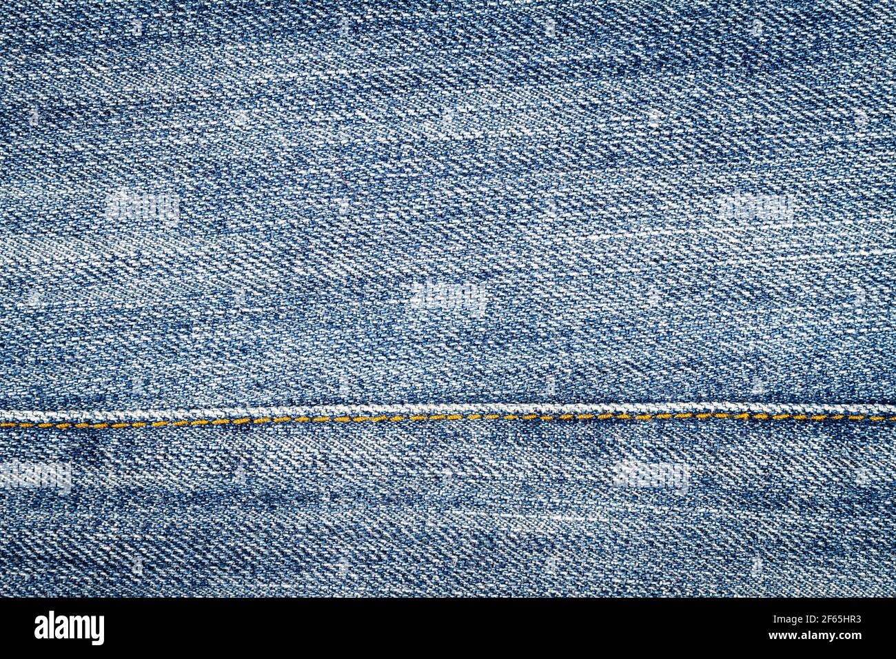 Light blue jeans texture. Denim fabric background with a seam Stock ...