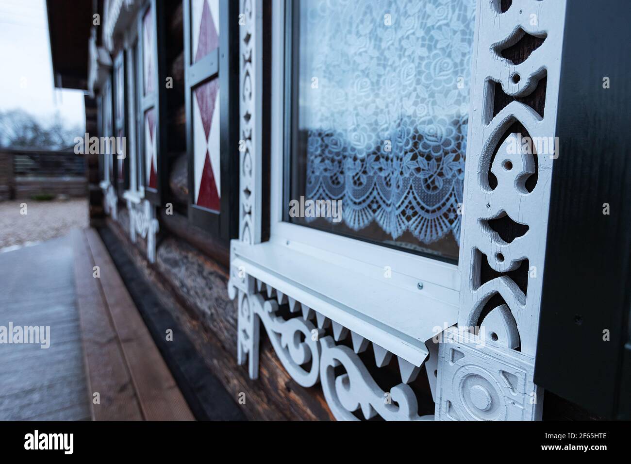 carved platbands on the windows. decorative decoration with wooden ...