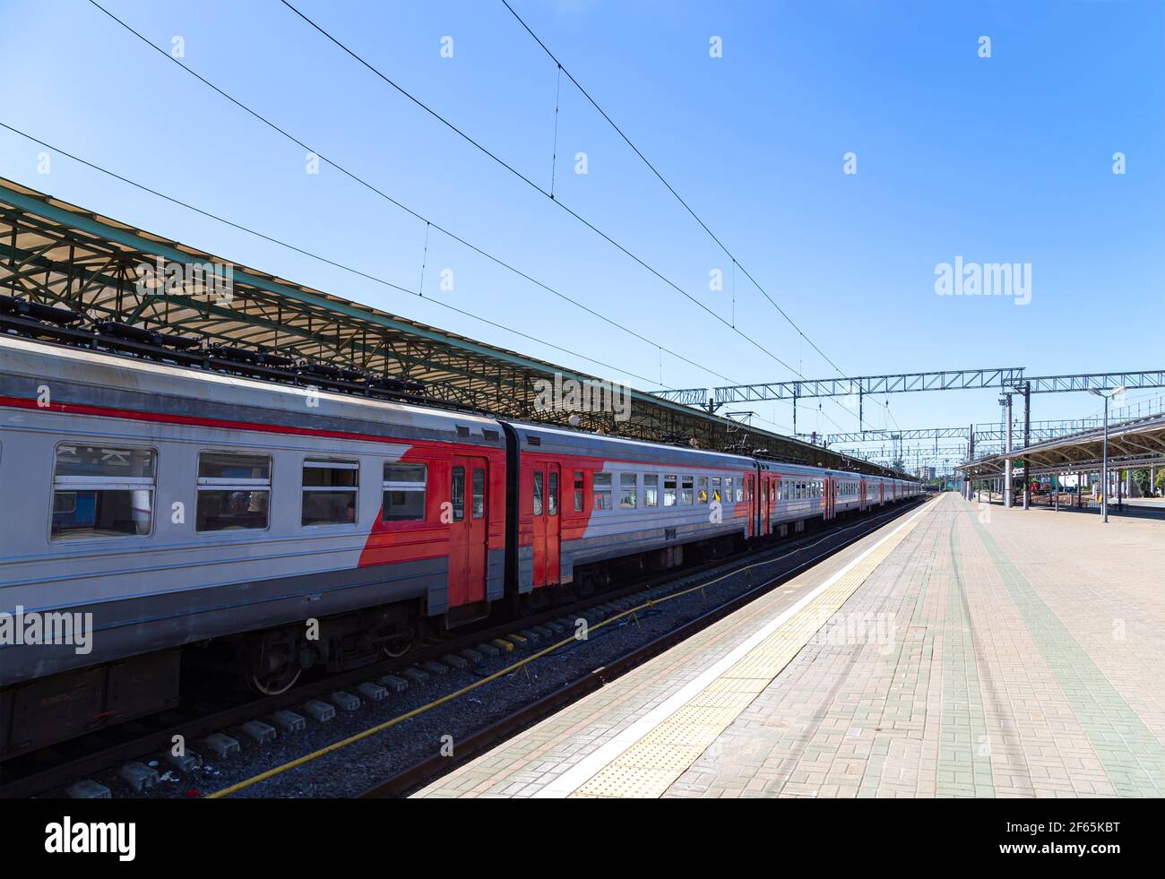 Train on Moscow passenger platform (Belorussky railway station) is one ...