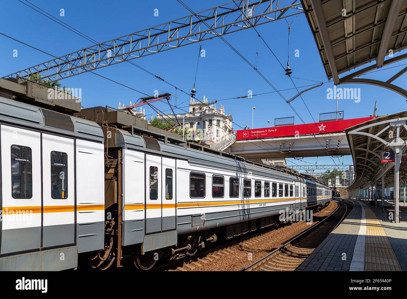 Train on Moscow passenger platform (Belorussky railway station) is one ...