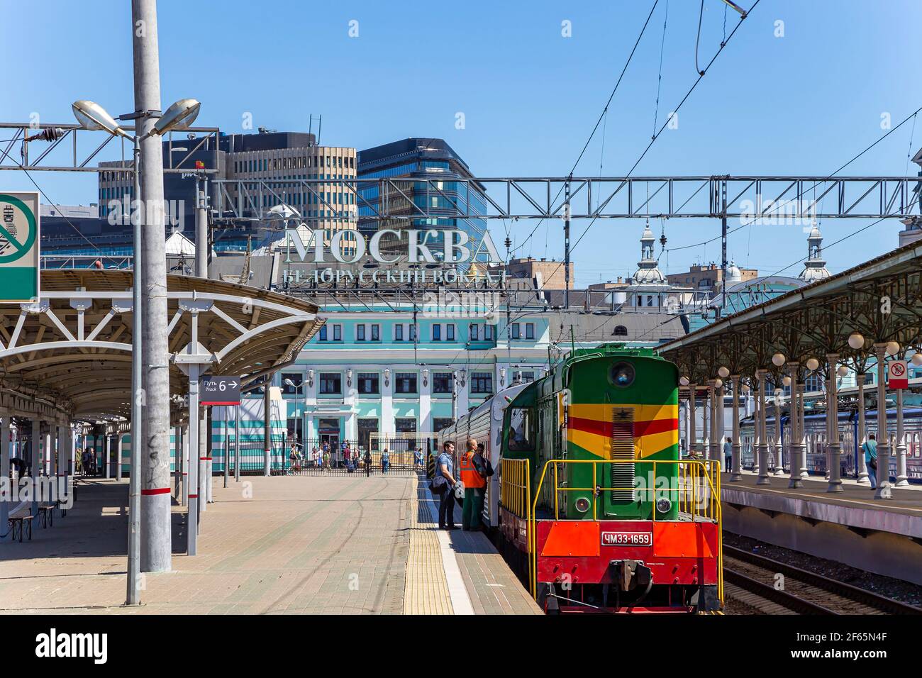 Train on Moscow passenger platform (Belorussky railway station) is one ...