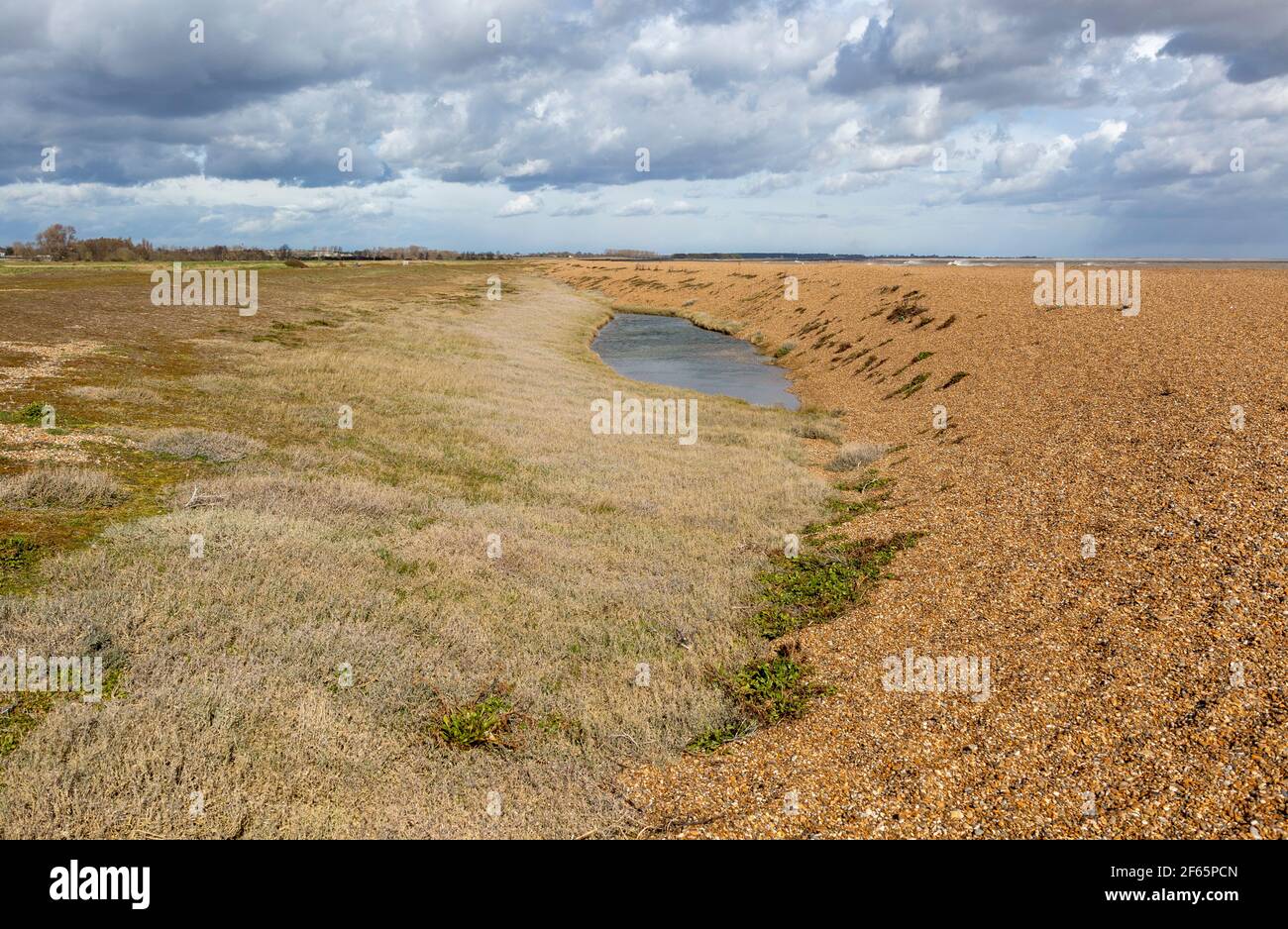Lagoon water in slack of shingle beach, Hollesley Bay, Shingle Street ...