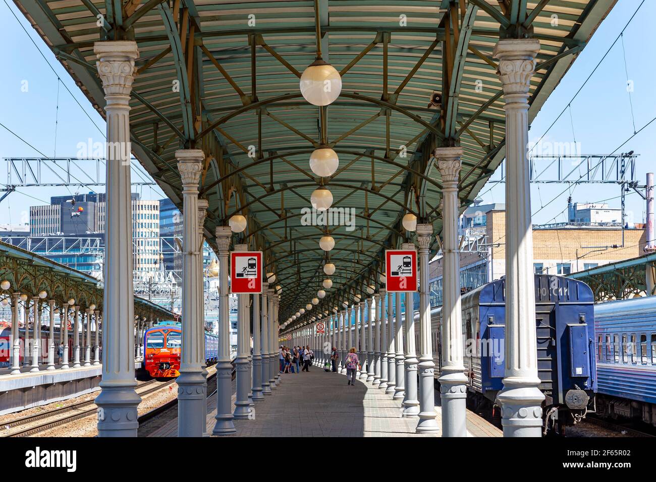 Train on Moscow passenger platform (Belorussky railway station) is one ...