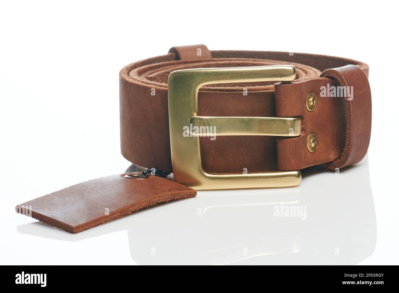 Brown leather belt close up view isolated on studio background Stock ...