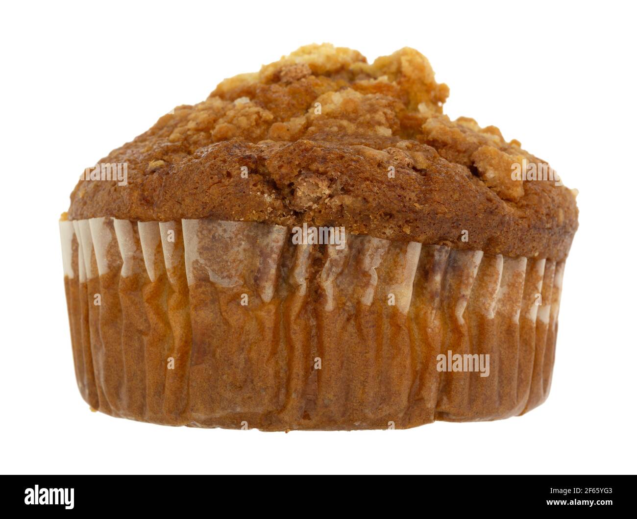 A single cinnamon crumb muffin isolated on a white background side view ...