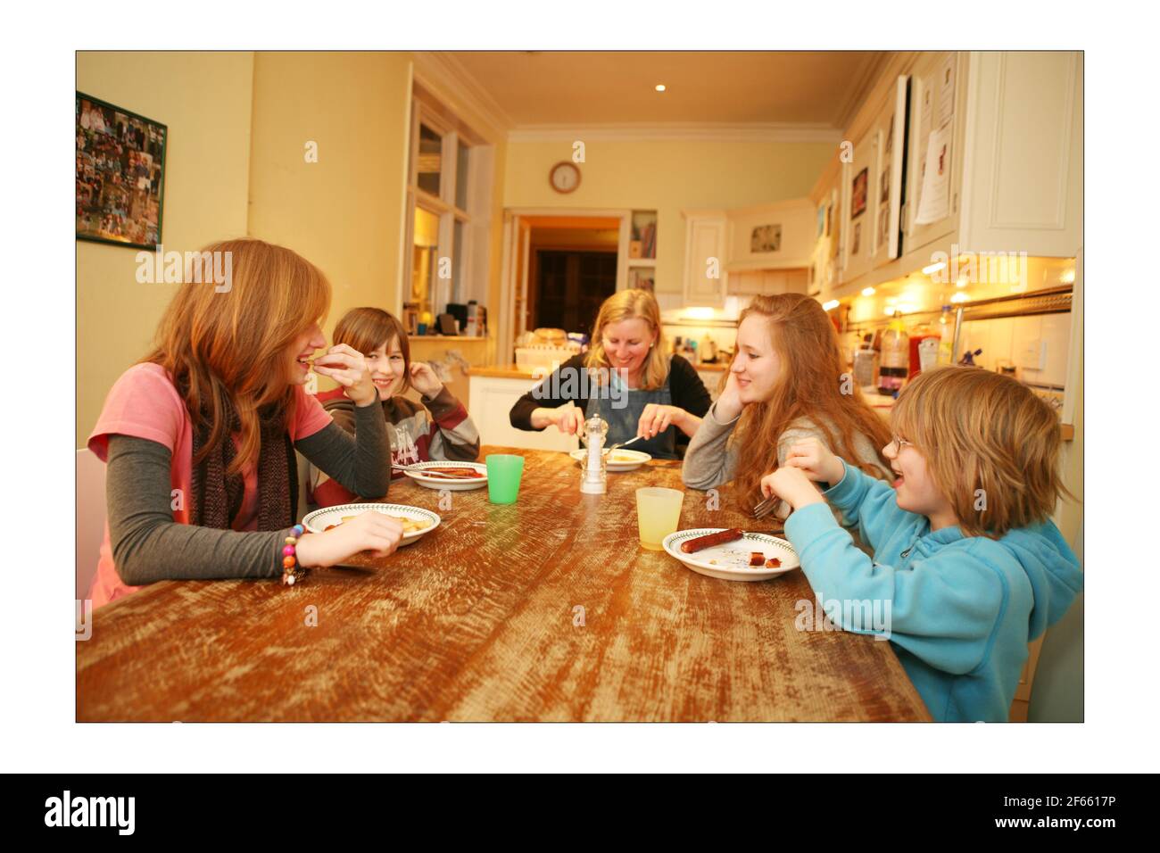 Joanna Moorhead with her daughters Rosie 16 (pink),Miranda 10 (stripe ...