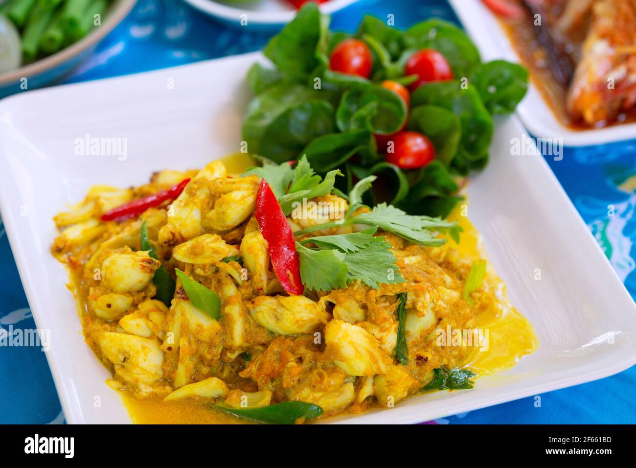 Coconut milk curry with crab and Fried crab in yellow curry. vegetable ...
