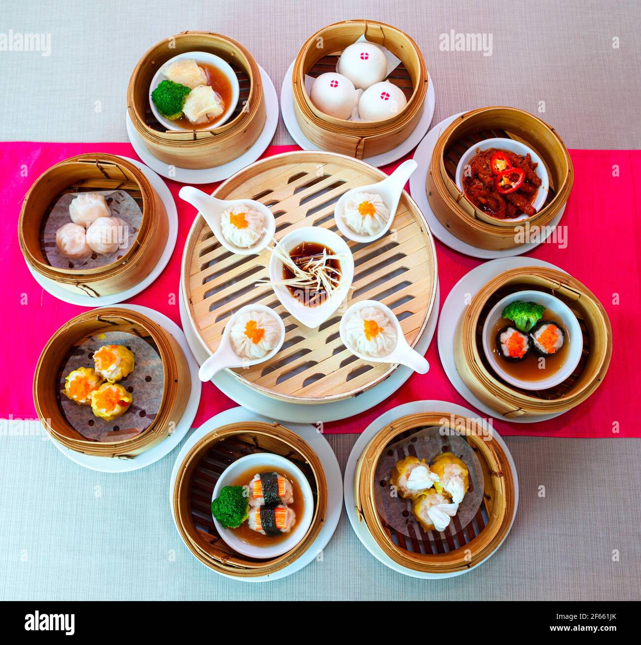 Different various kinds of dim sum including dumplings traditional ...