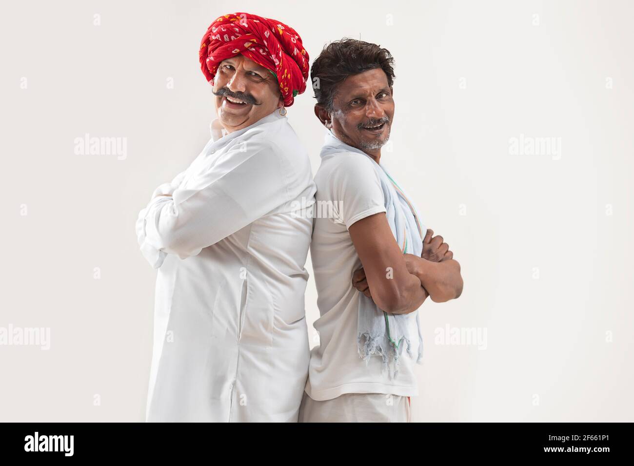 TWO ADULT VILLAGERS STANDING TOGETHER AND POSING Stock Photo - Alamy