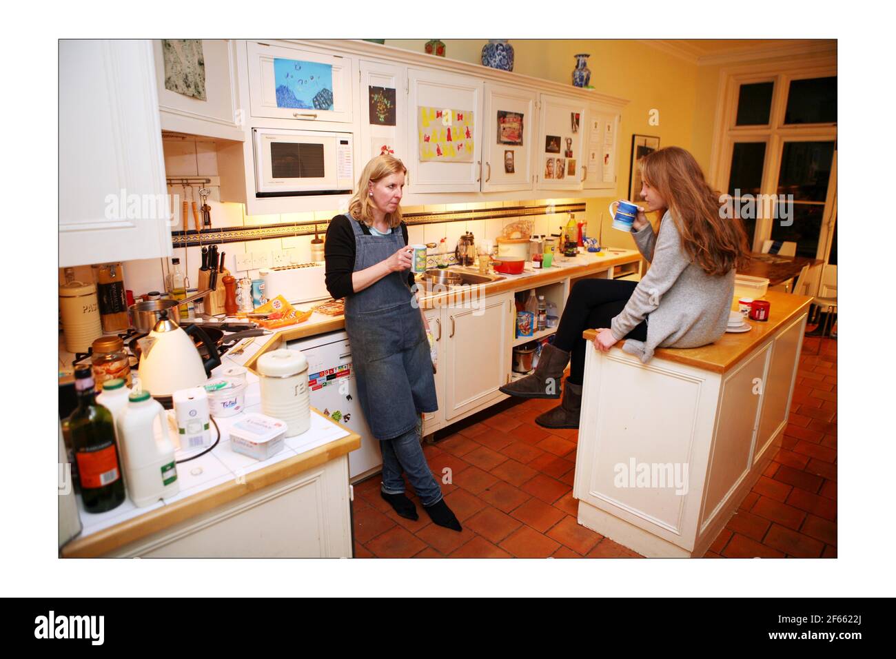 Joanna Moorhead with her daughter Elinor 14 (grey top ) photograph by ...