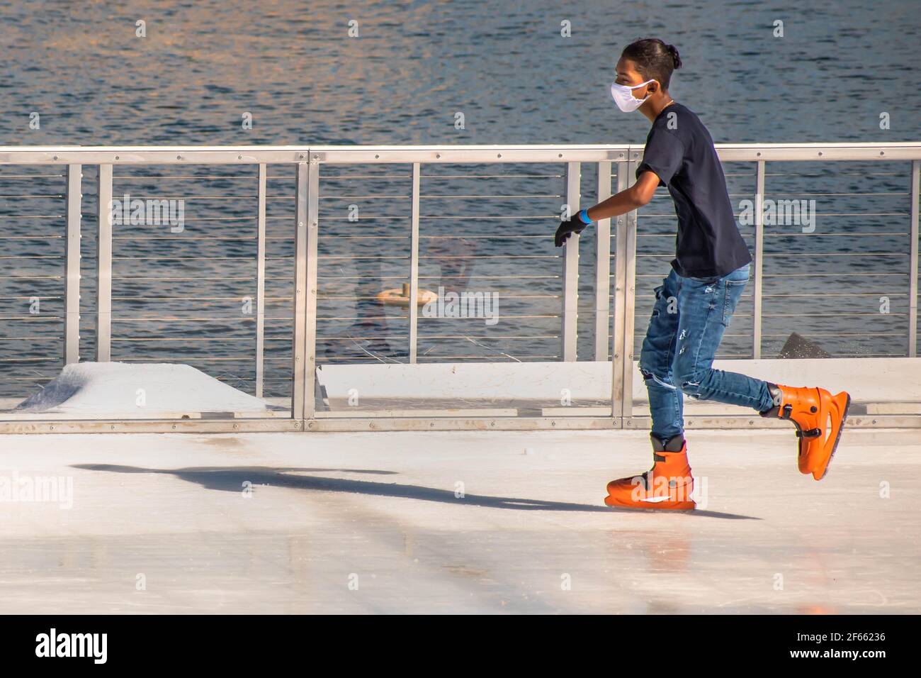 Orlando, Florida. December 22, 2020. People skating on ice rink at ...