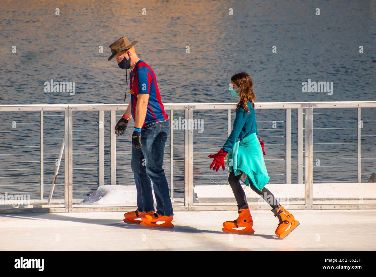 Orlando, Florida. December 22, 2020. People skating on ice rink at ...