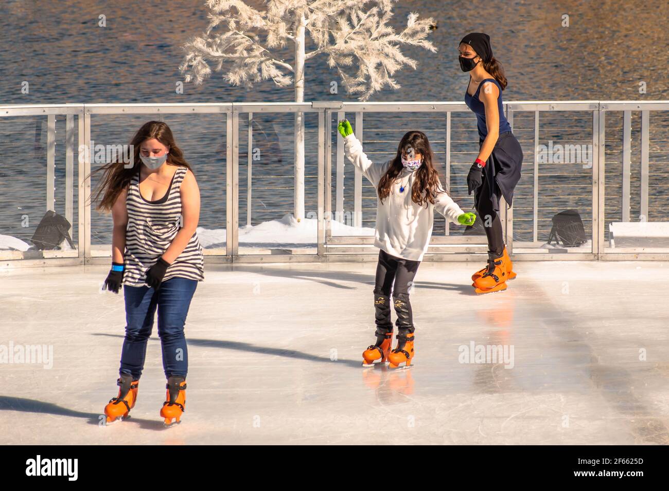 Orlando, Florida. December 22, 2020. People skating on ice rink at ...