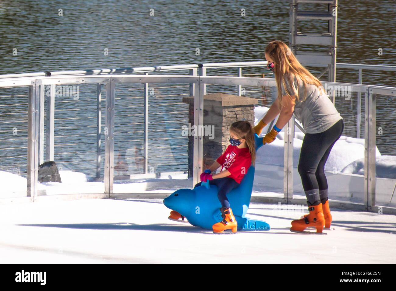 Orlando, Florida. December 22, 2020. People skating on ice rink at ...
