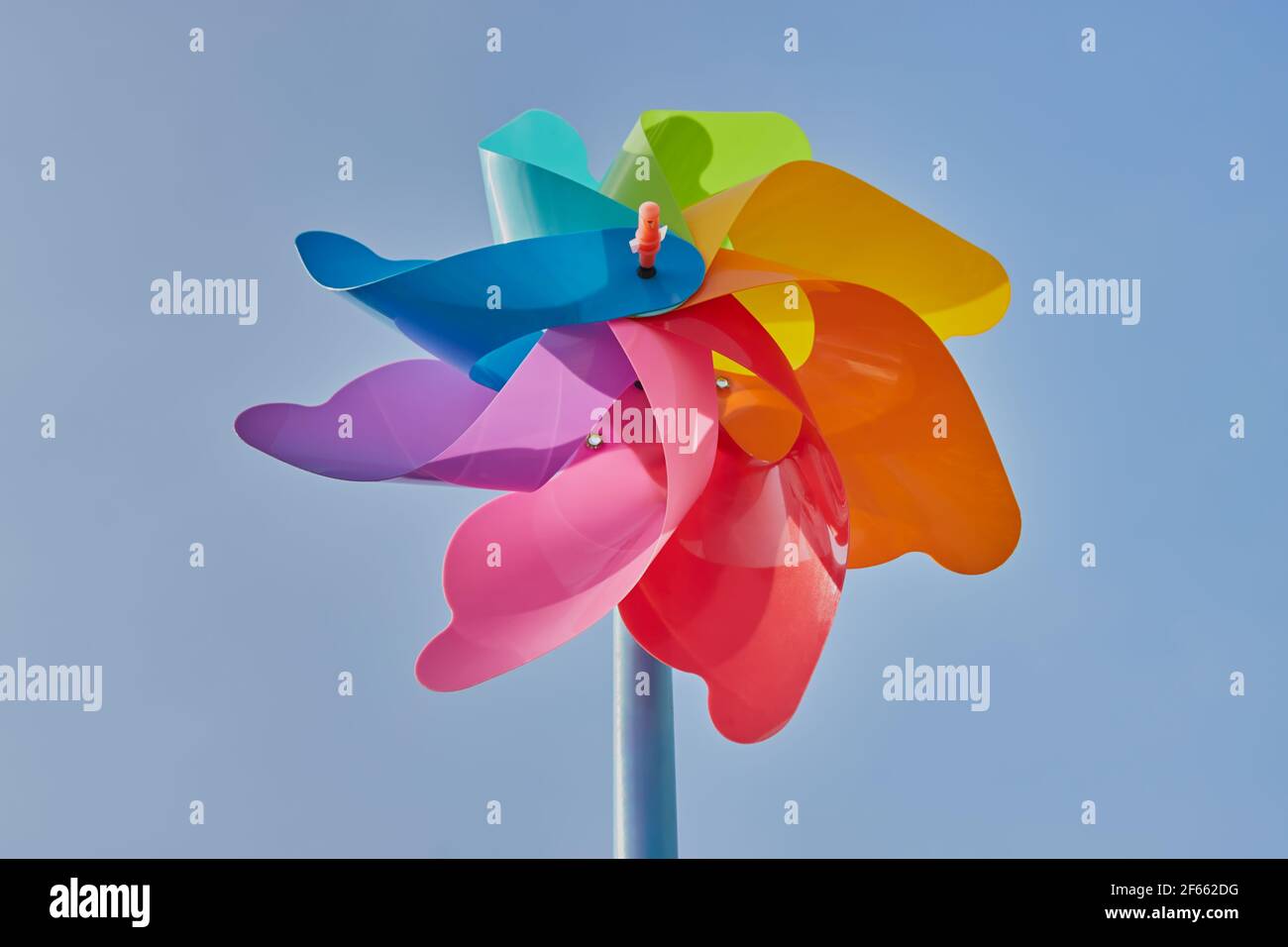 Low Angle Rainbow Pinwheel on Blue Sky Background with Natural Light ...