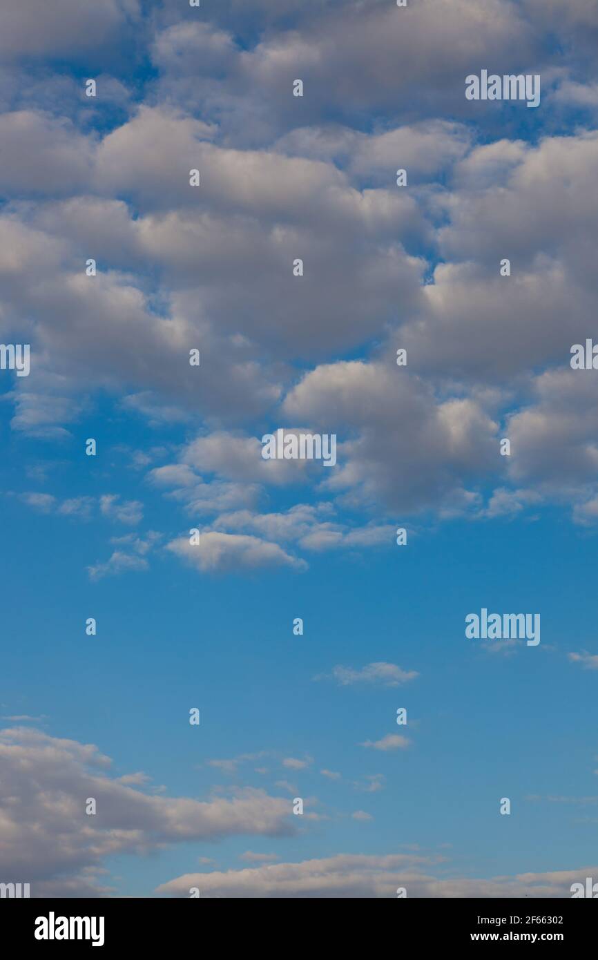 Blue sky with clouds at daytime Stock Photo - Alamy