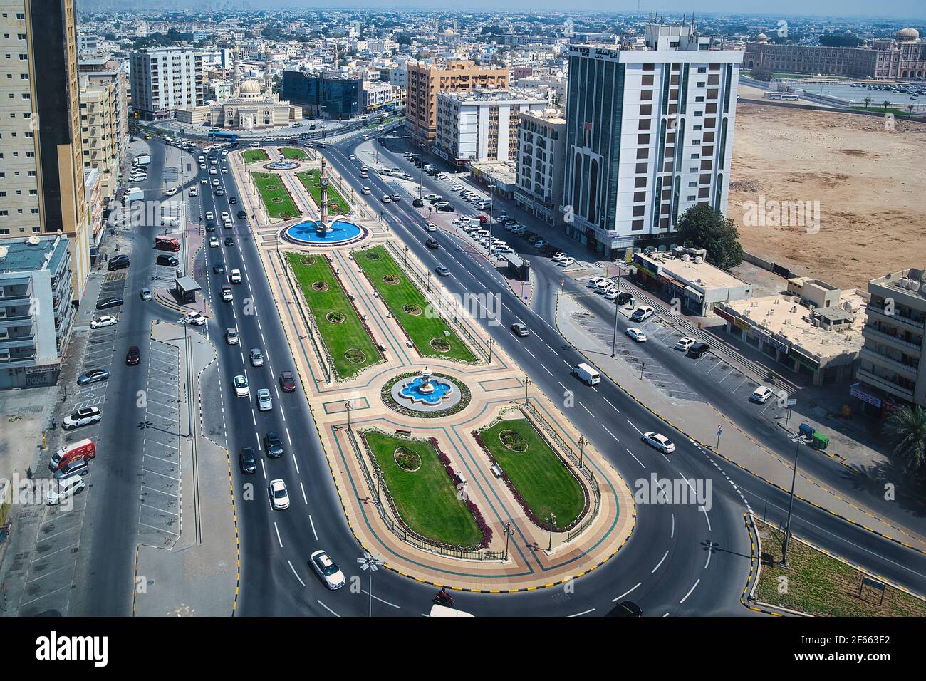 Zahra tower and Sharjah Clock Tower with mosque in Sharjah emirate ...