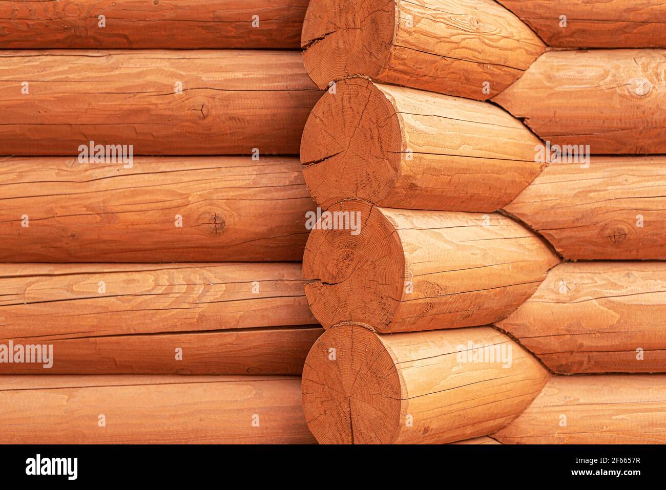 Texture of a wooden blockhouse made of logs Stock Photo - Alamy