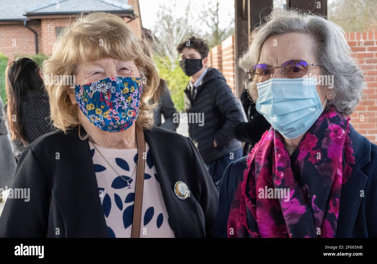 England, UK. 2021. People wearing colourful masks during the Covid-19 ...
