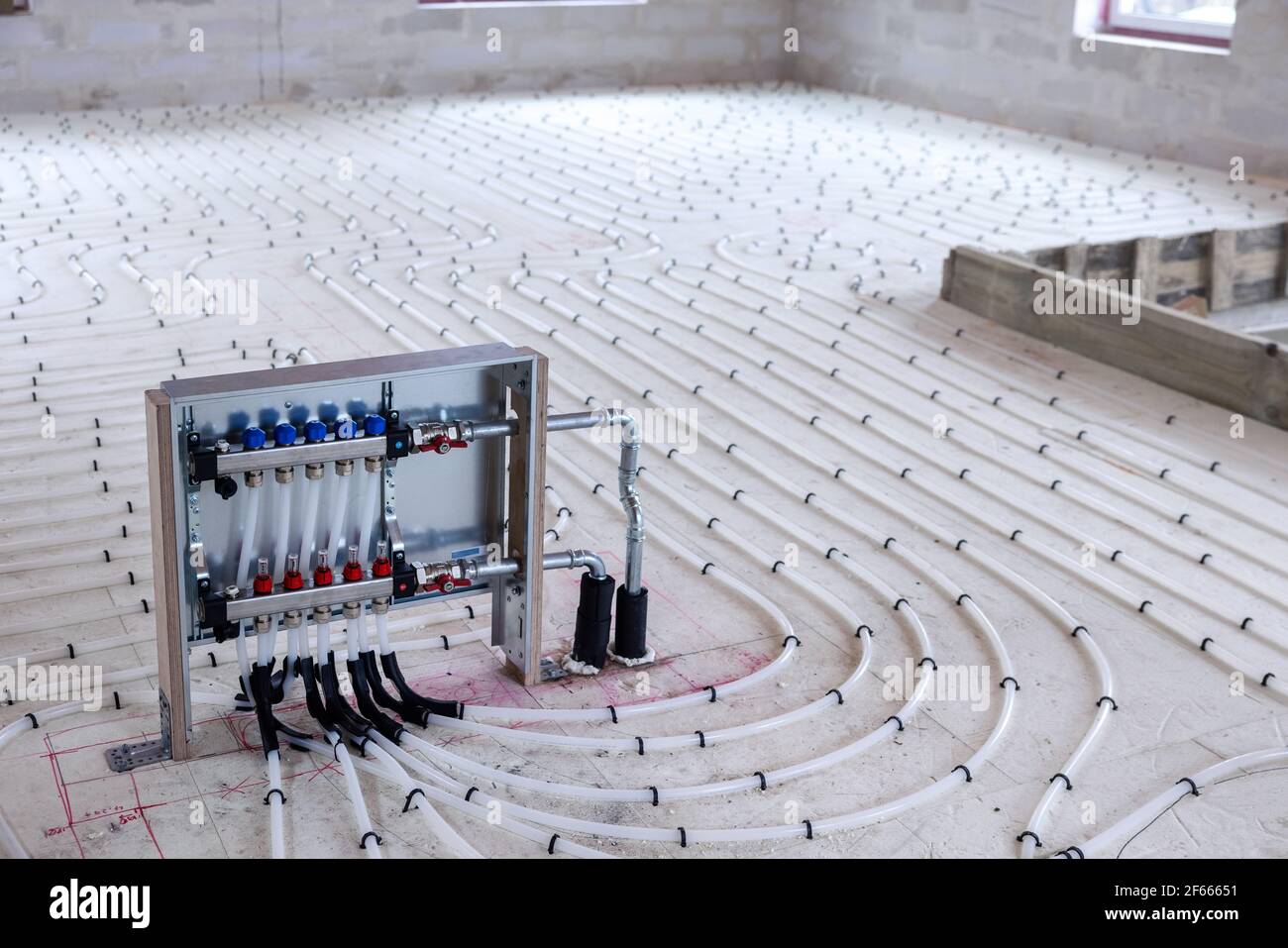 underfloor heating system - water pipes with collector on the new ...