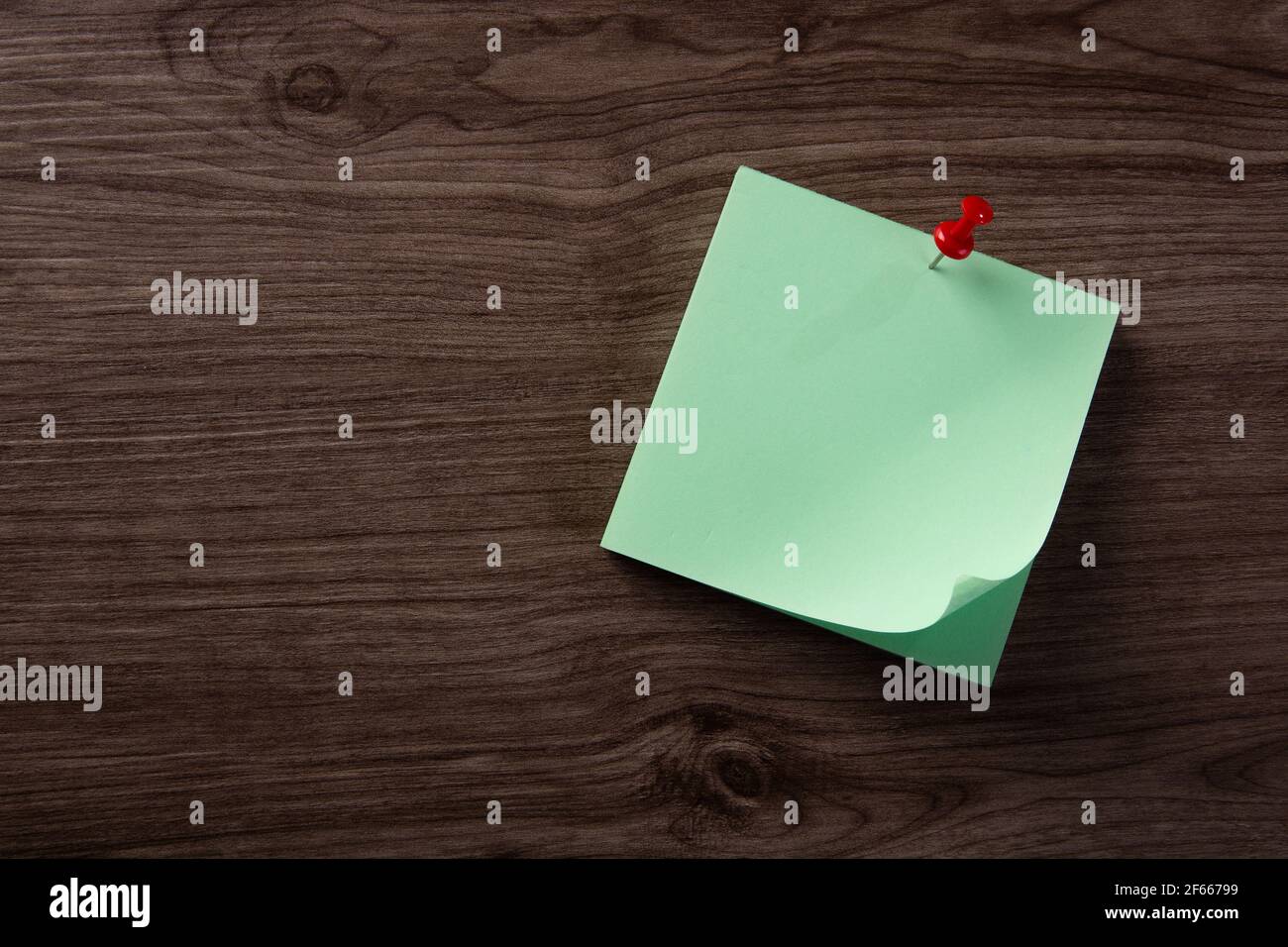 color blank notepad on wooden background Stock Photo - Alamy
