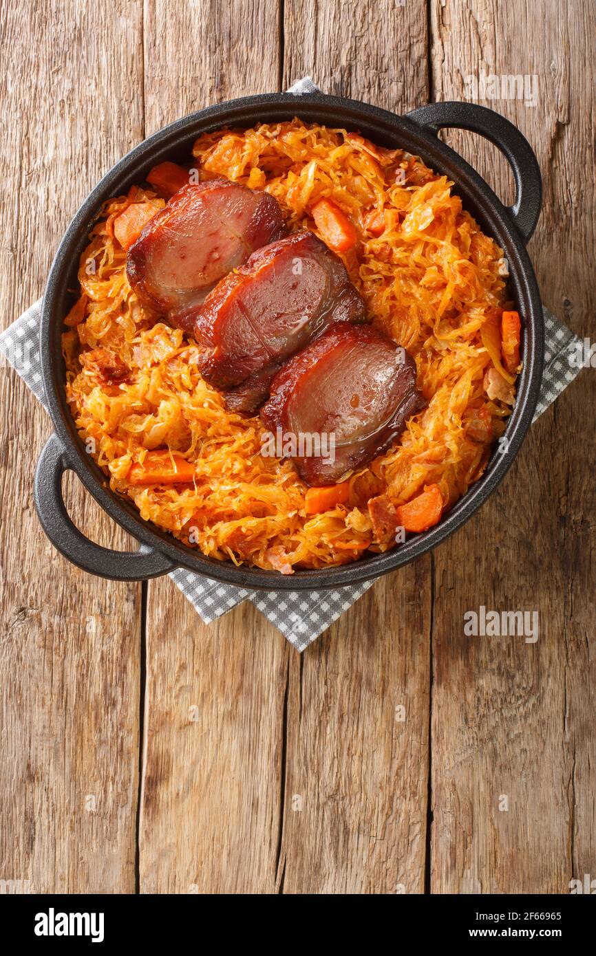 Serbian Baked Sauerkraut Podvarak with smoked pork and bacon closeup in ...