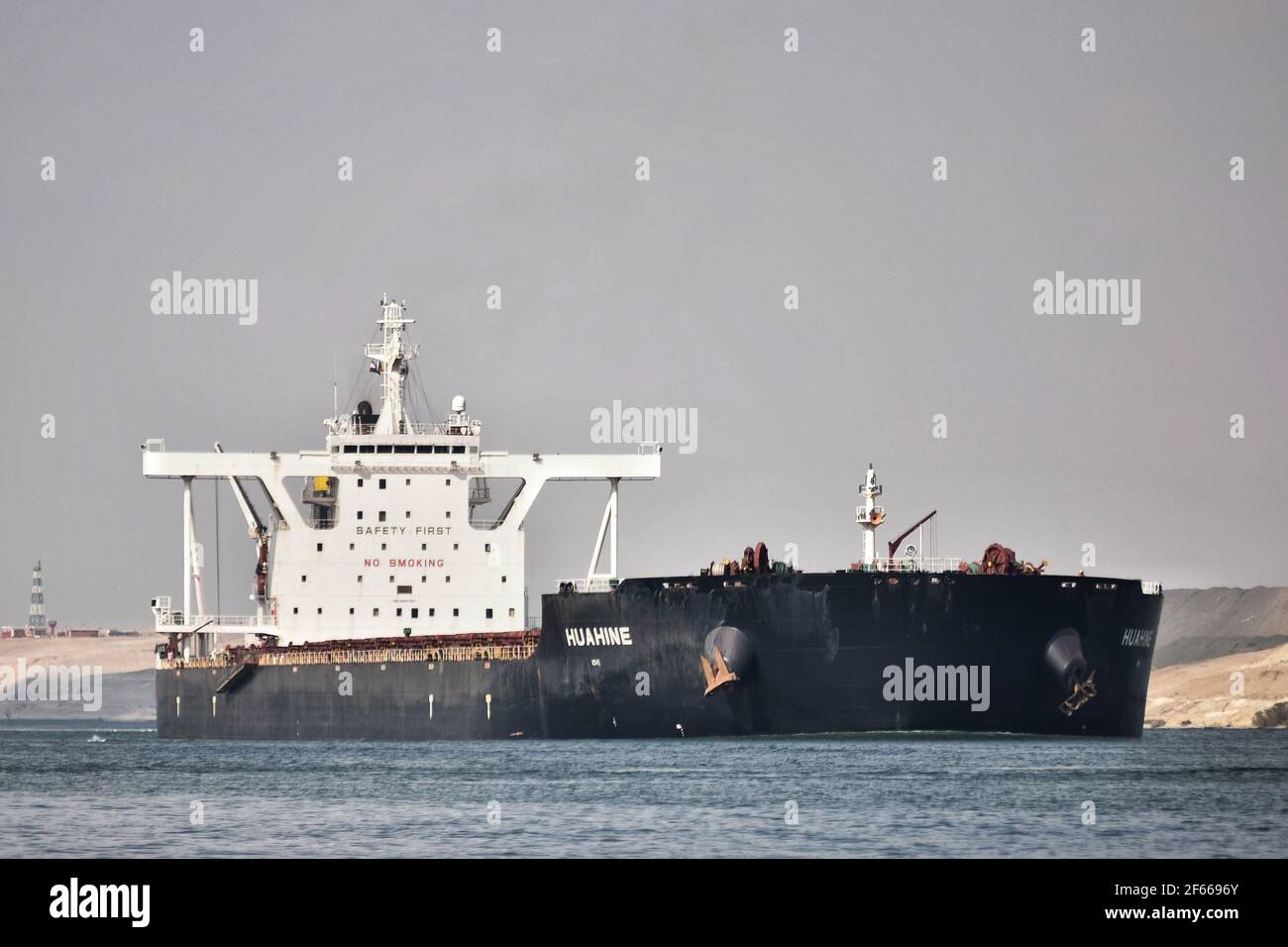 Ismailia, Egypt. 30th Mar, 2021. A ship sails through the Suez Canal as ...