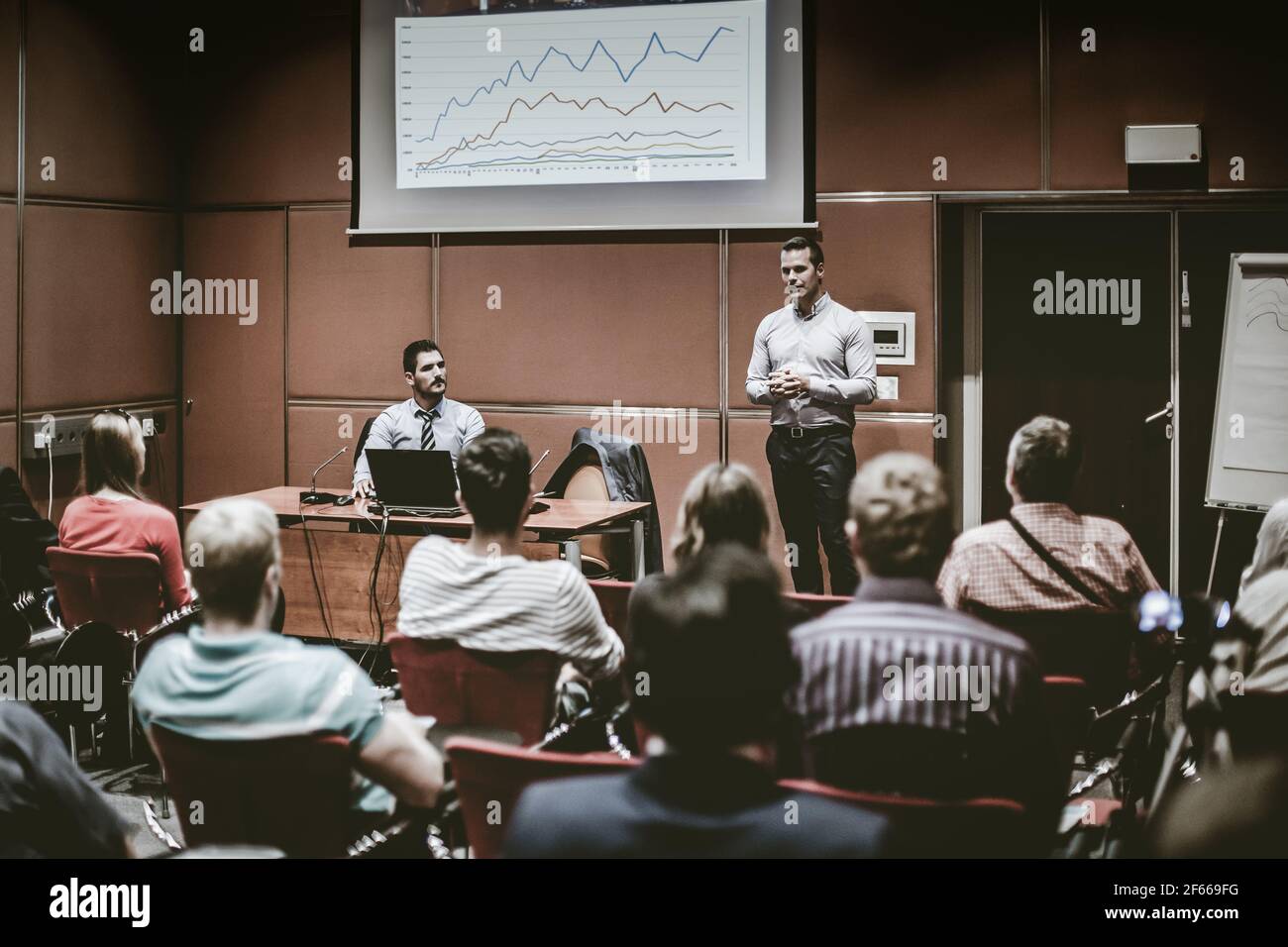 Business speaker giving talk at business conference event Stock Photo ...