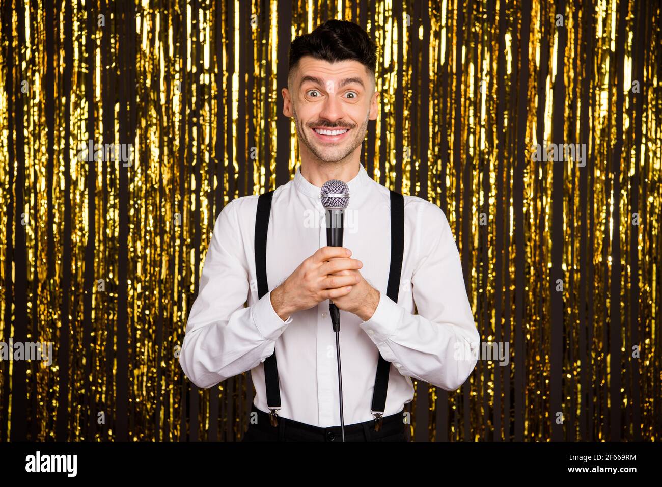 Photo of young cheerful man happy positive smile sing microphone ...