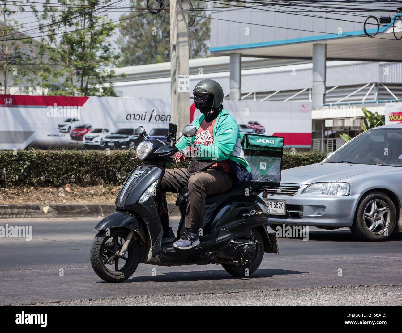 Chiangmai, Thailand - March 4 2021: Delivery service man ride a ...