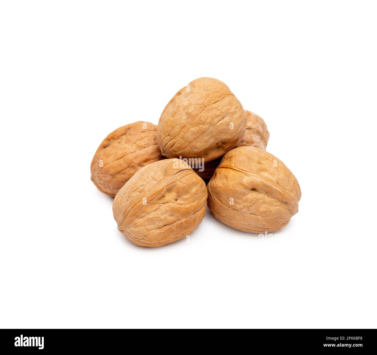 group of dried walnuts on white background Stock Photo - Alamy