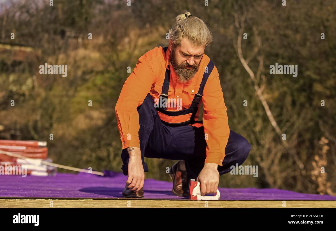 Roof Mechanic concept. Inspect repair and replace. Assemble temporary ...