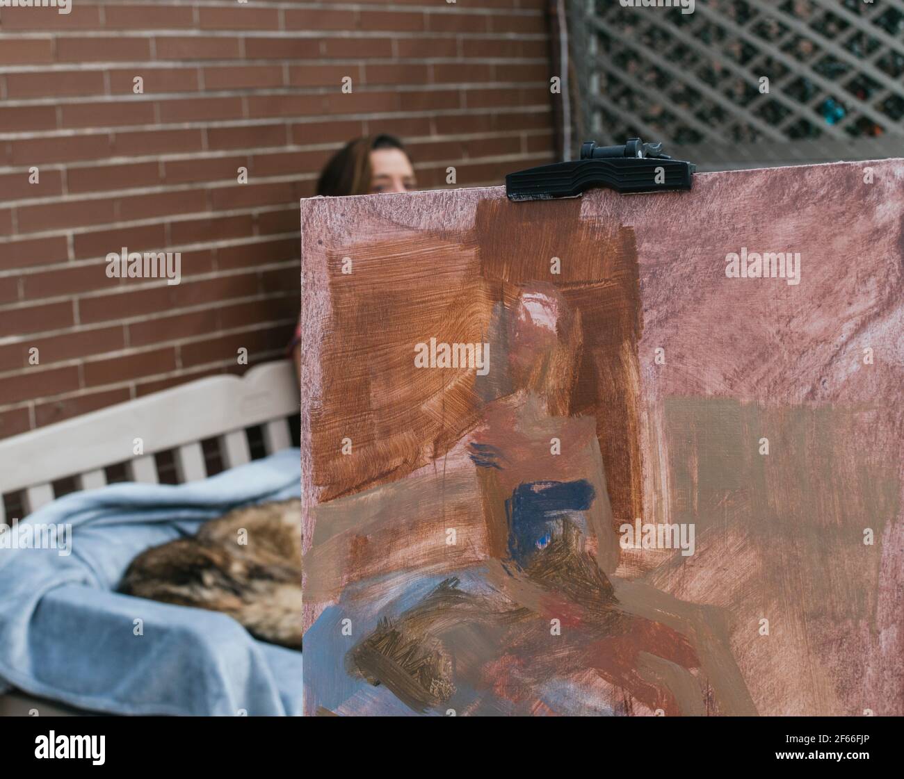 Painting artist drawing a picture on a terrace, painter, palette and ...