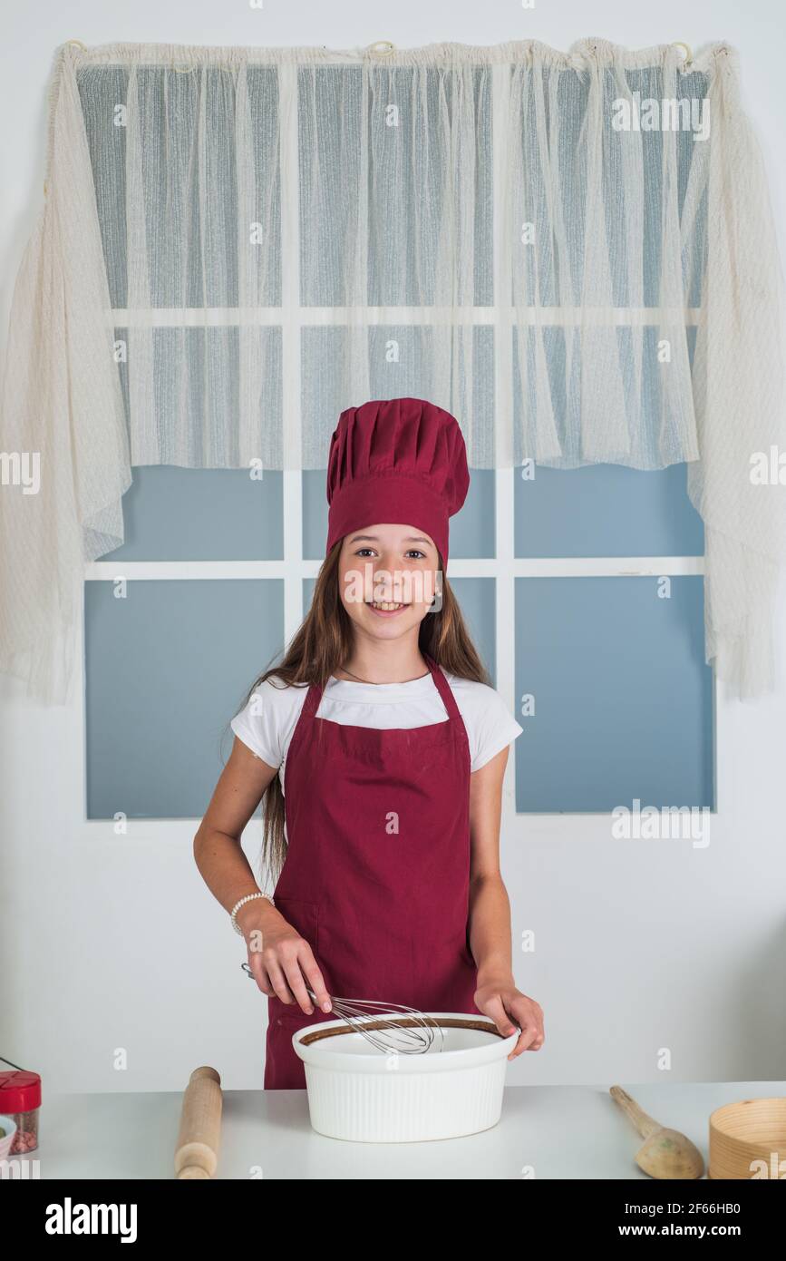 child cooking food in kitchen, childhood Stock Photo - Alamy