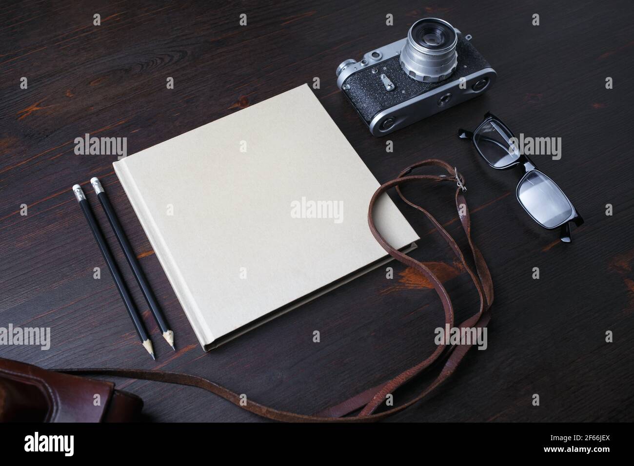 Vintage stationery and retro photo camera on wooden background Stock ...