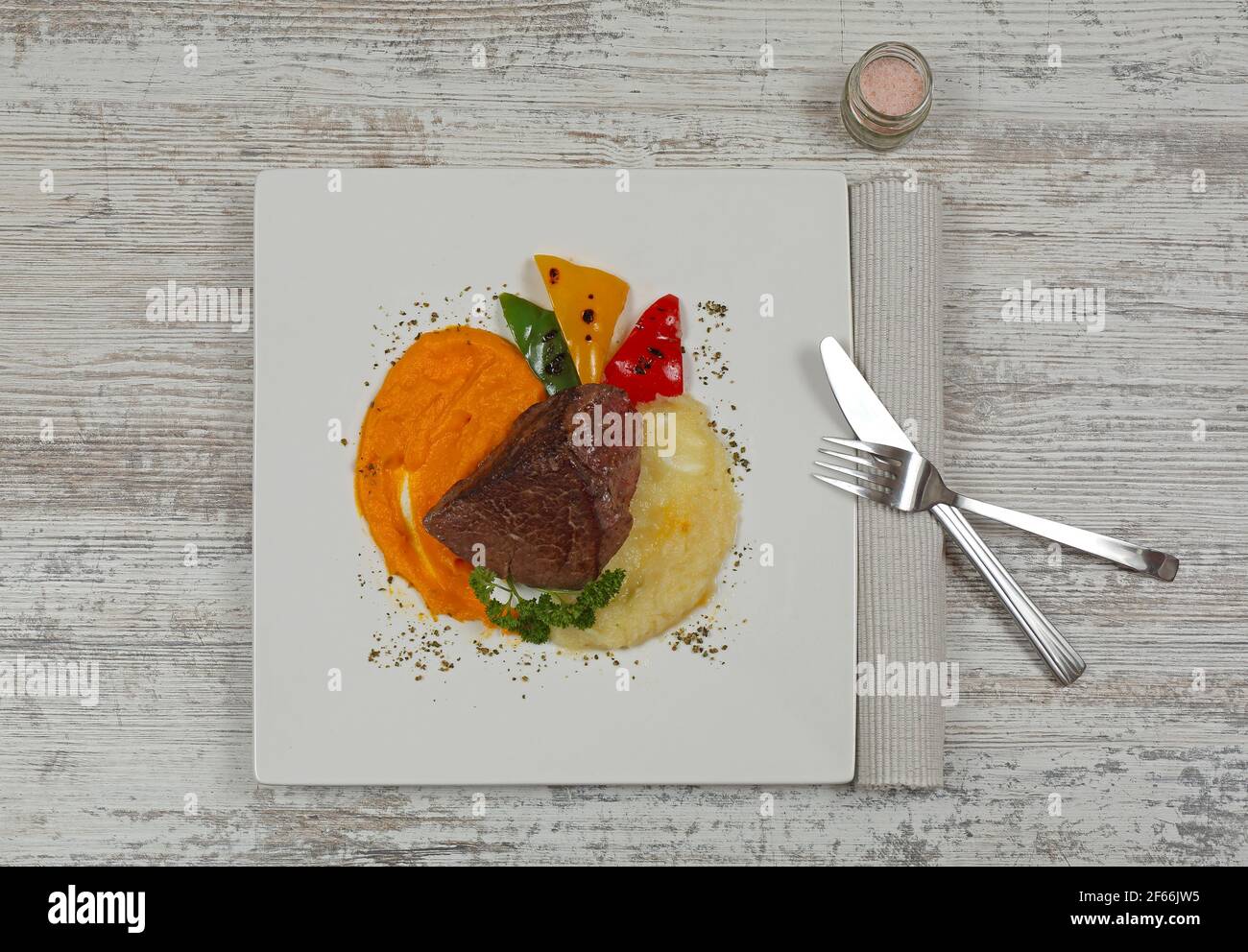 Beef Steak With Pureed Potato and Carrots at Square Plate Top View ...