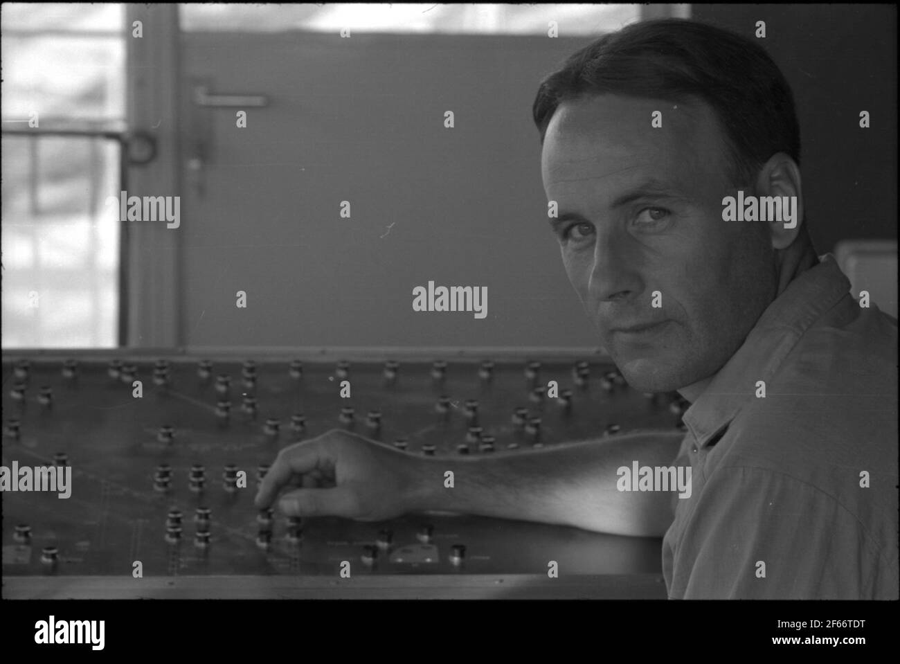 Staff in the ranging tower at Angle Station. Staff at an electrical ...