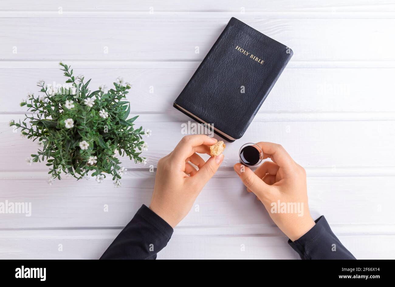 Young woman praying and Taking communion Stock Photo - Alamy