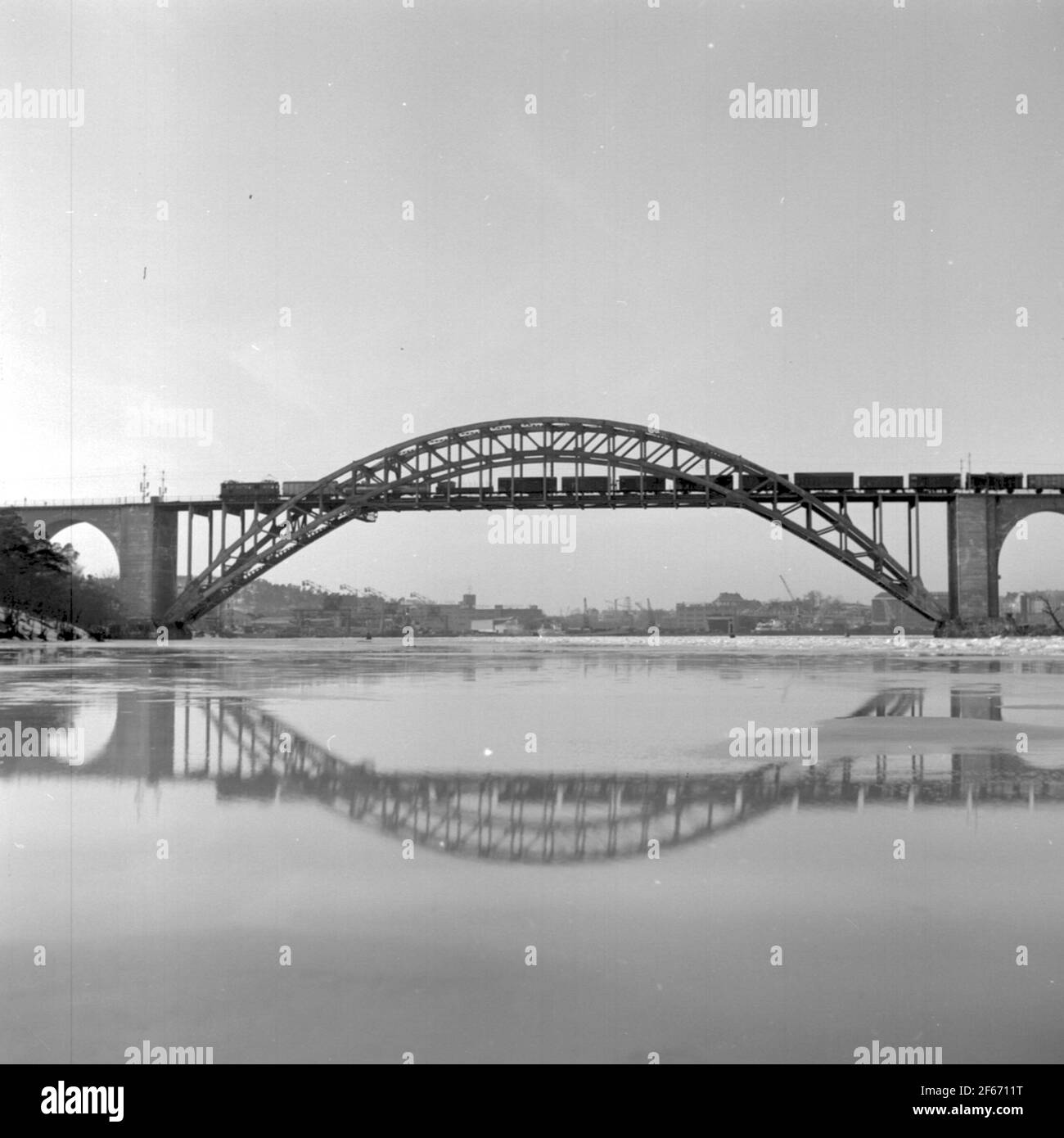 Freight trains pass the bridge Stock Photo - Alamy