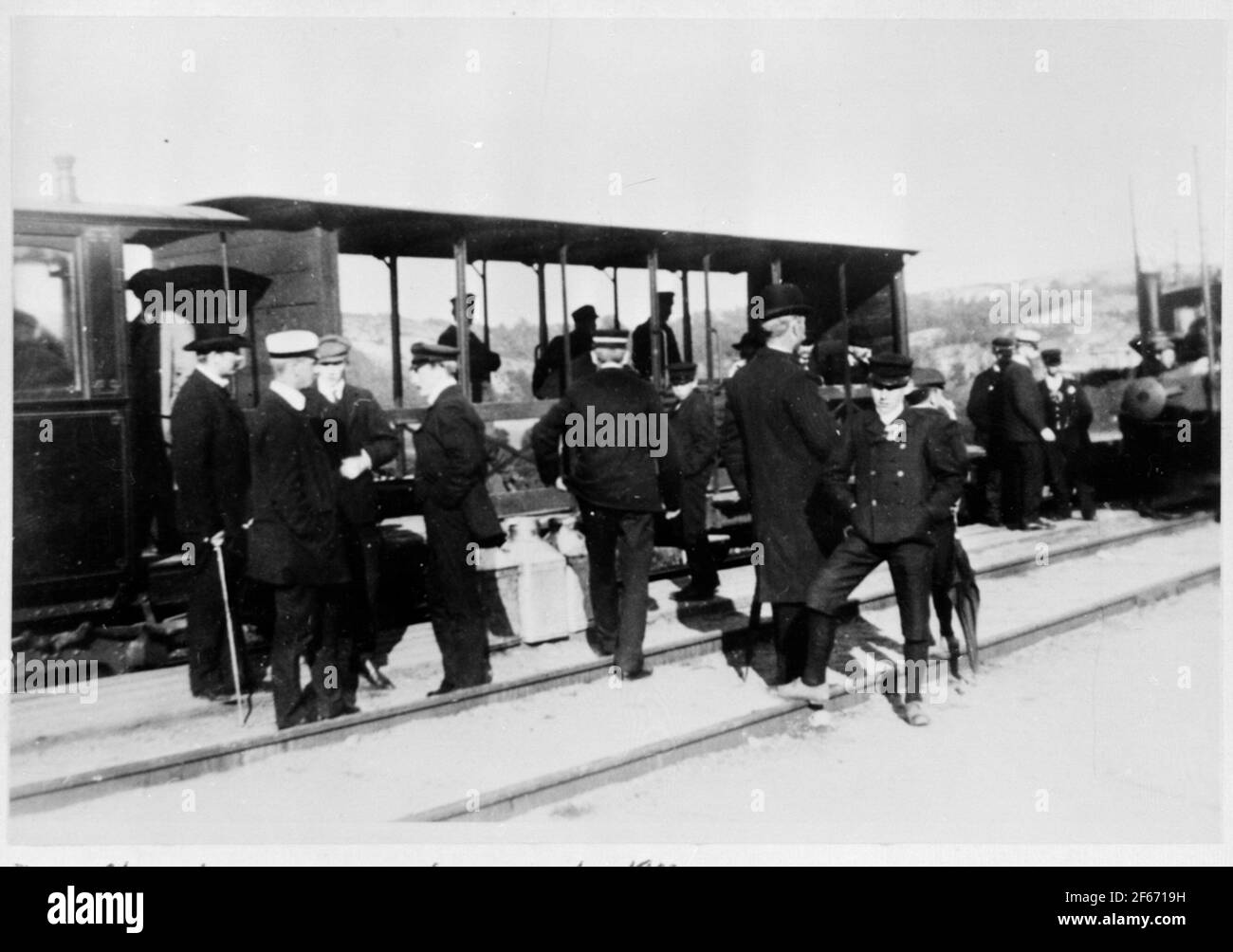 Traveling on the track next to the open passenger car Stock Photo - Alamy