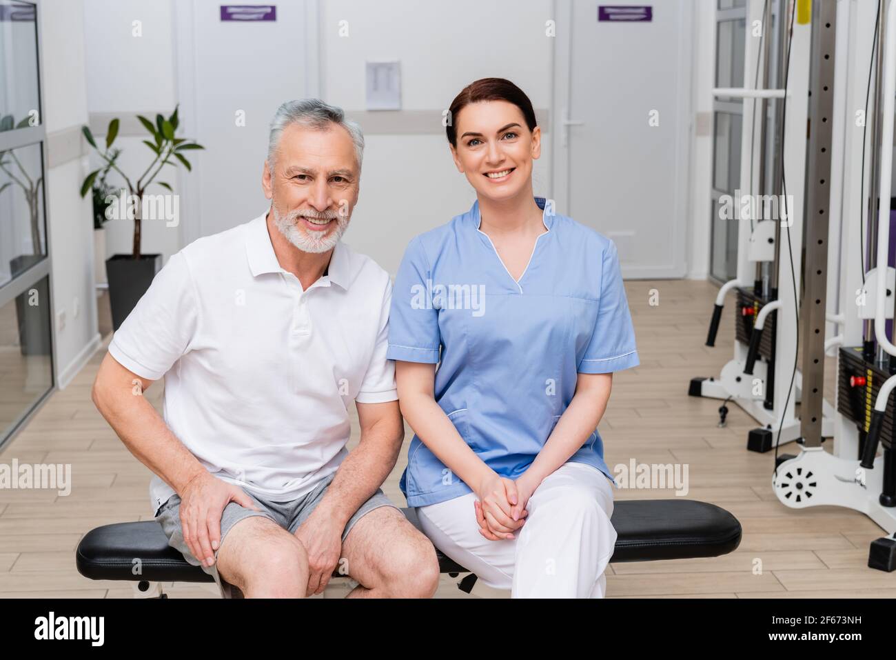 Medical doctor sitting on bench hi-res stock photography and images - Alamy