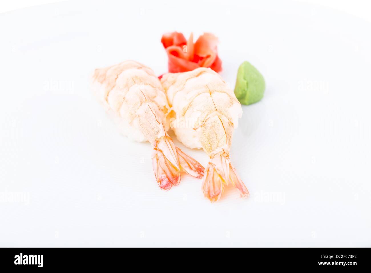 Traditional japanese shrimp nigiri sushi. Served with heap of ginger ...