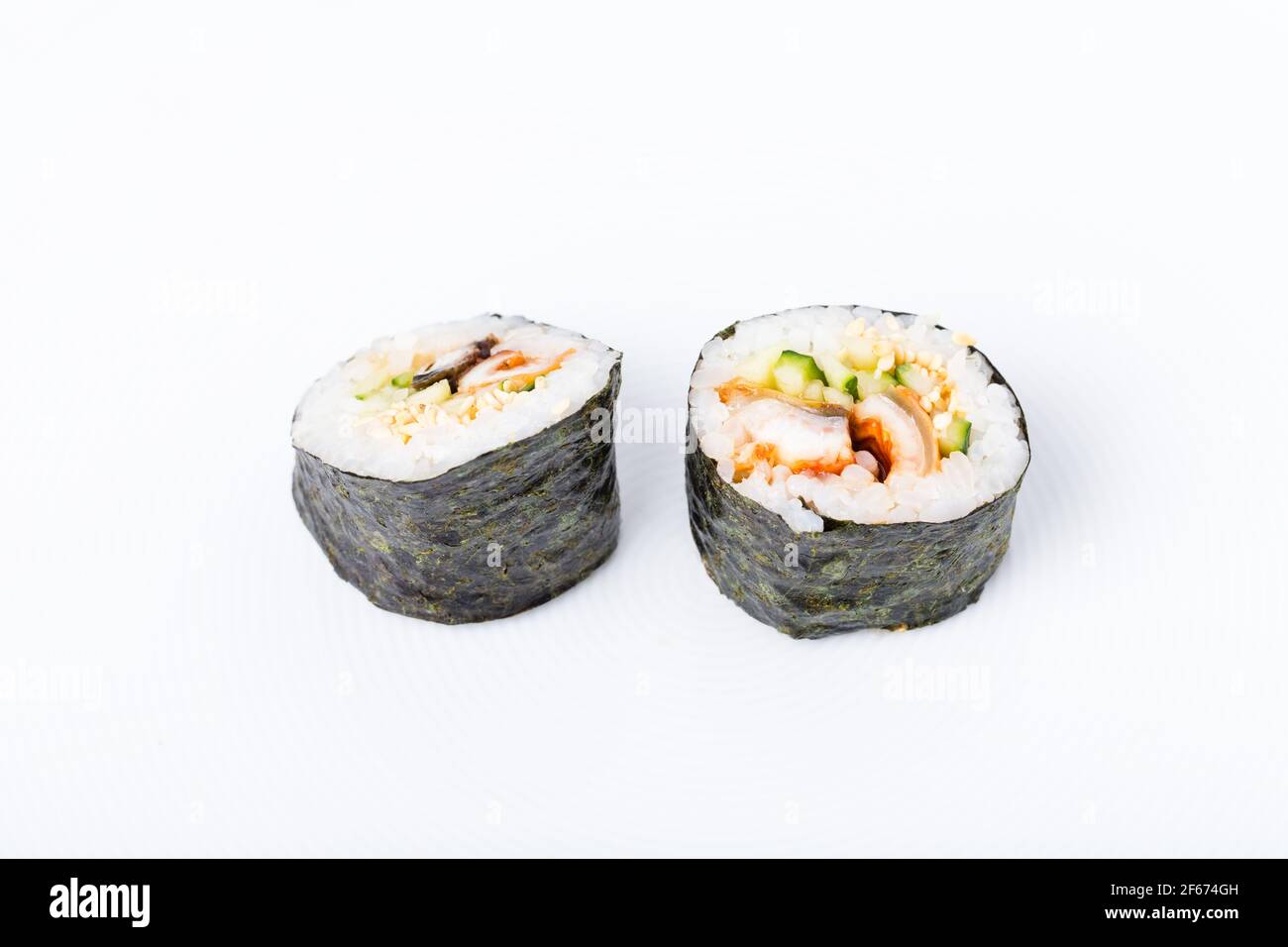 Delicious smoked unagi roll with cucumber and sesame seeds. Macro ...