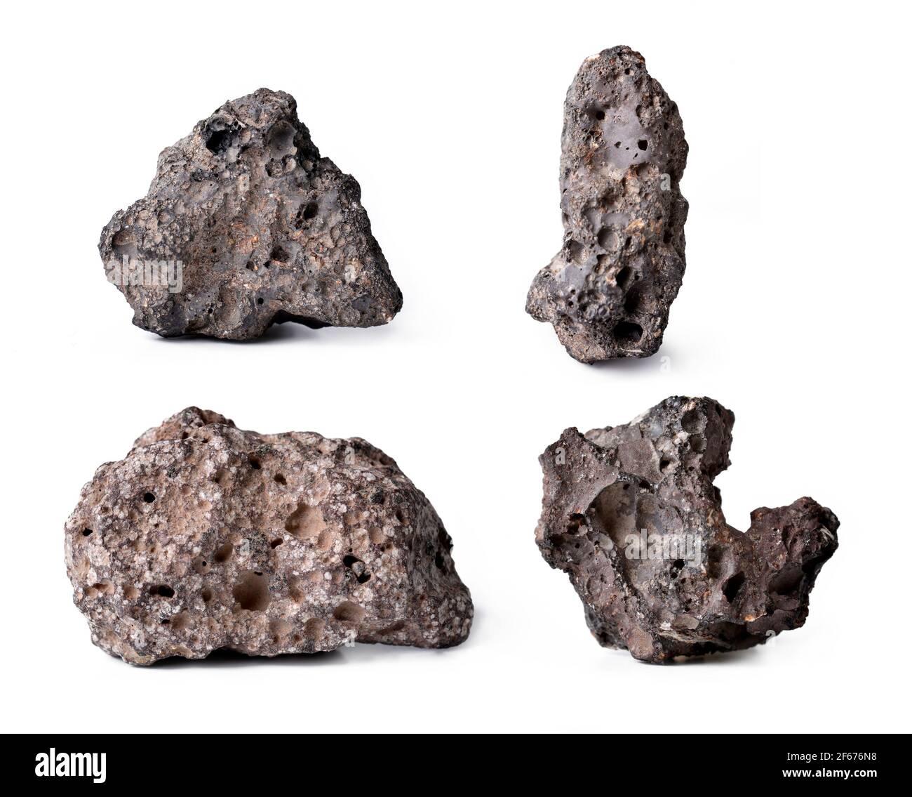 The volcanic stones isolated on white background Stock Photo - Alamy