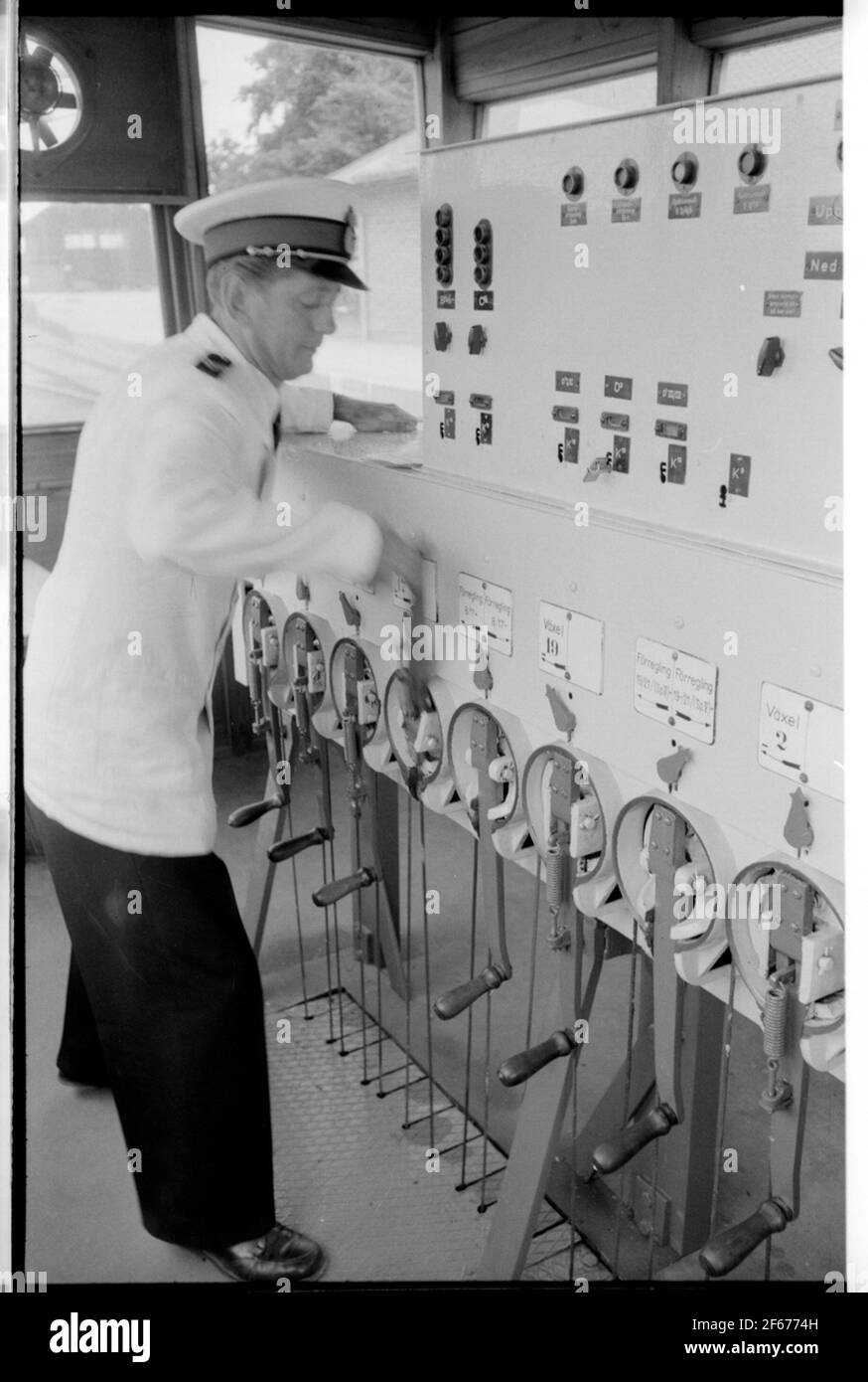 Train staff in action at switchgear Stock Photo - Alamy
