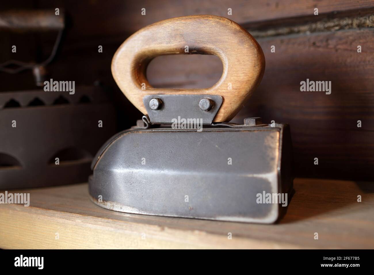 Details of old flat iron in the antique store Stock Photo - Alamy