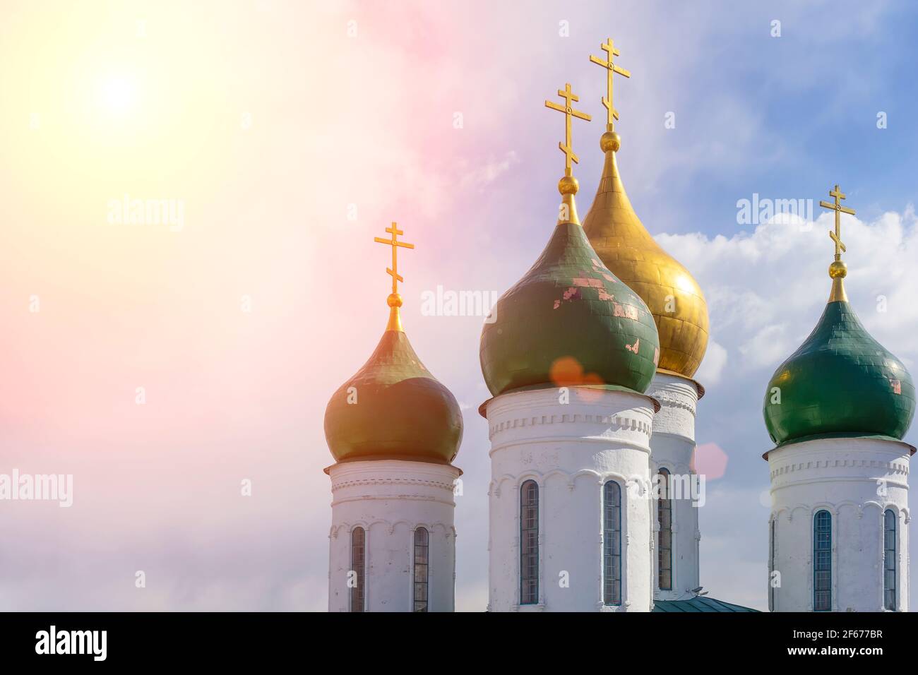 Russian Christian Orthodox church with domes and a cross against the ...