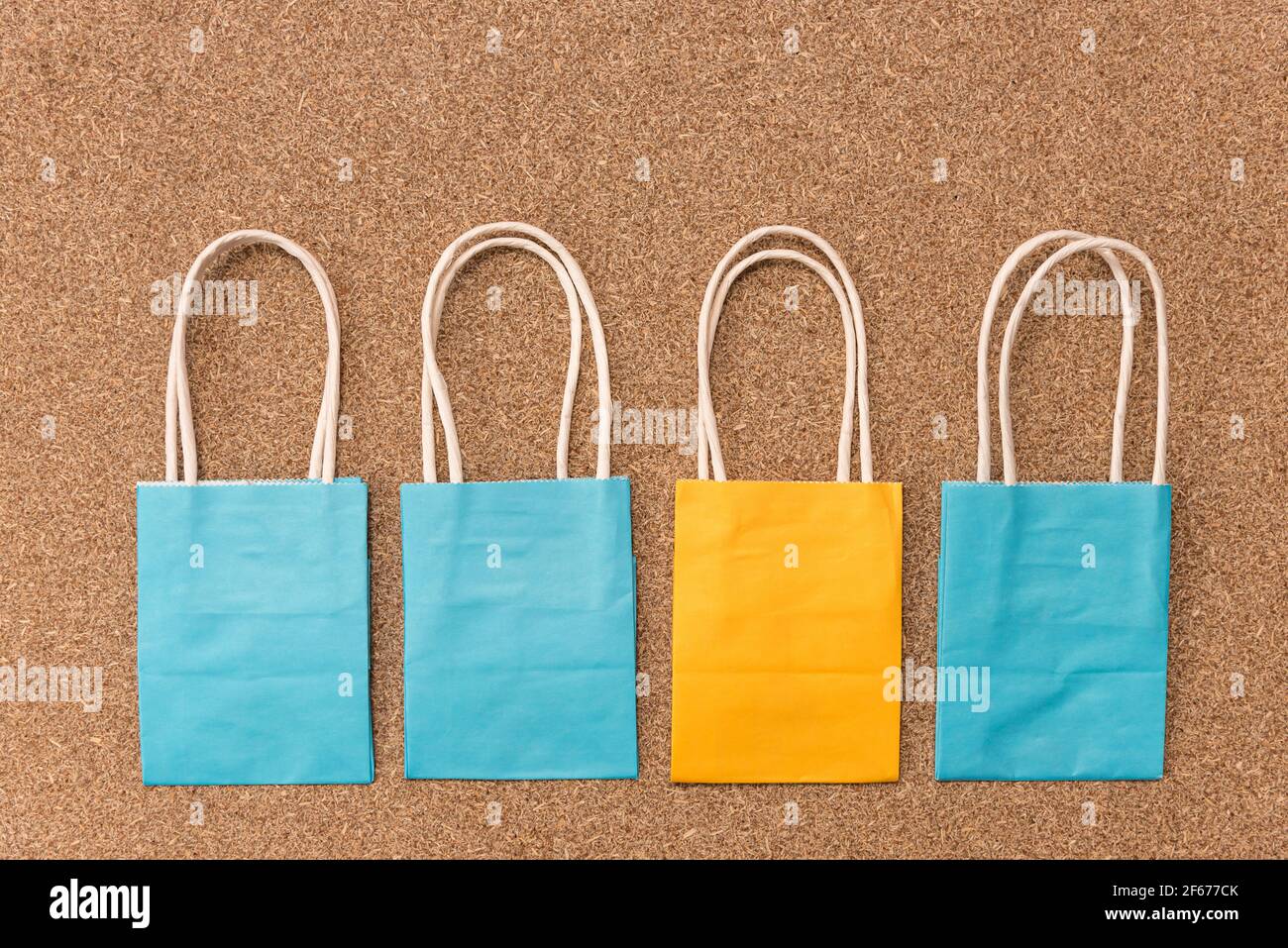 Solid paper craft packages in bright colours Stock Photo - Alamy